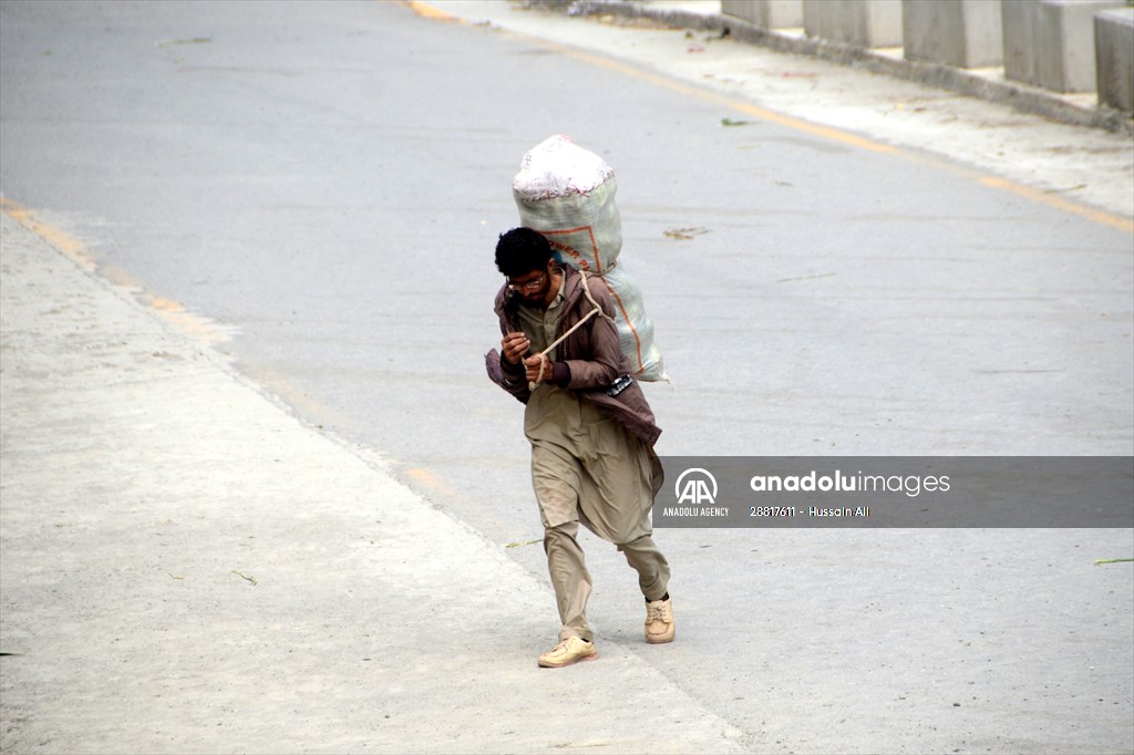 People carry food on their backs due to flood-destroyed bridges and ...