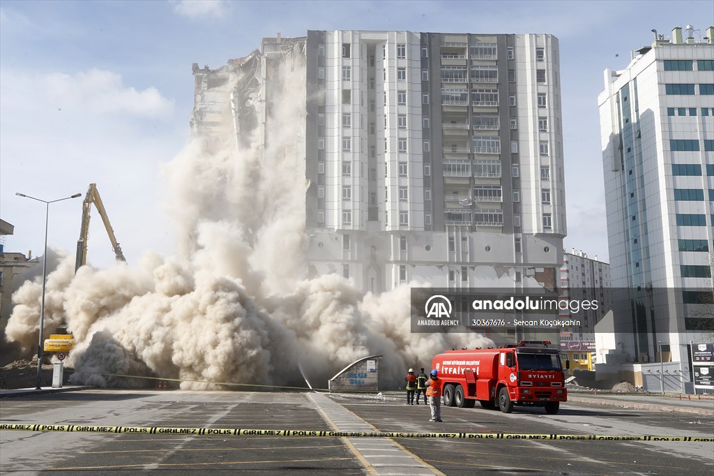 Demolishing of a damaged 12-storey-building after earthquakes hit ...