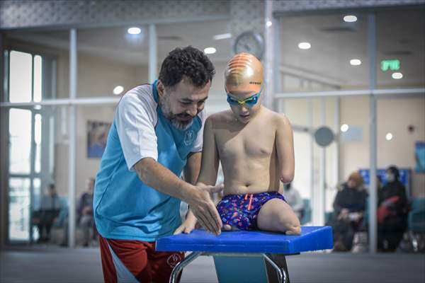 7-year-old Turkish boy, who was born without legs and an arm, aim to ...