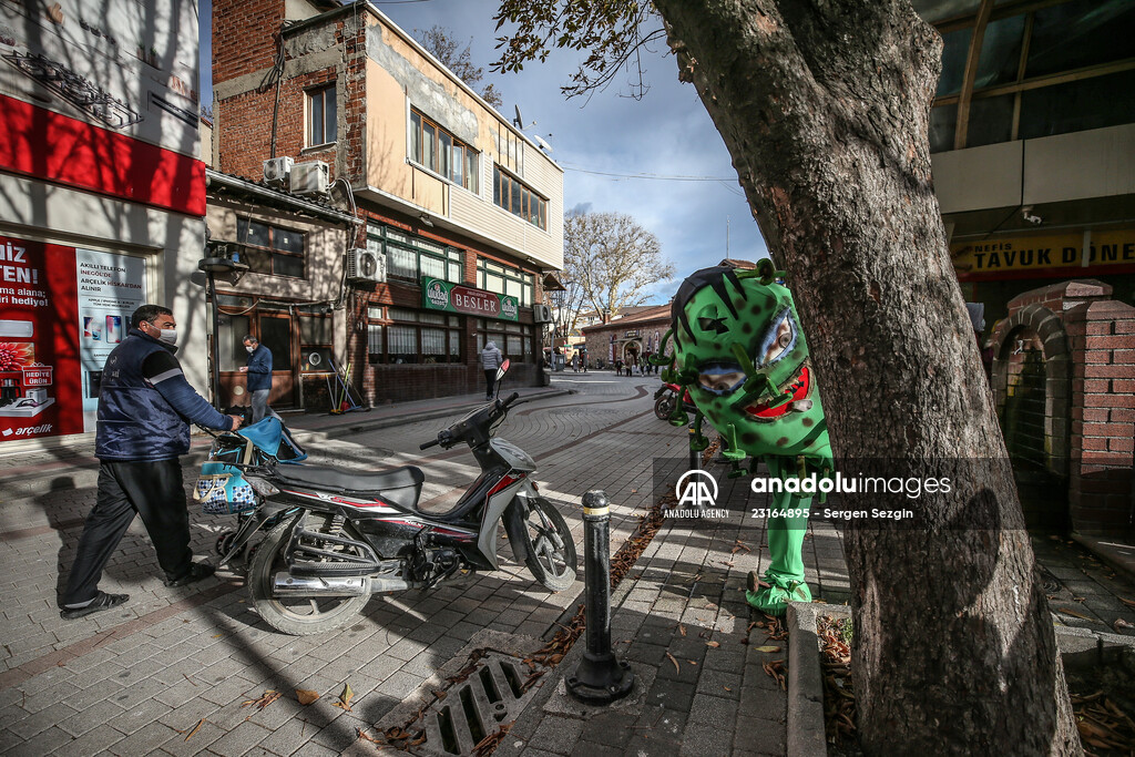Municipality staff with Covid-19 costume in Turkey's Inegol warn ...